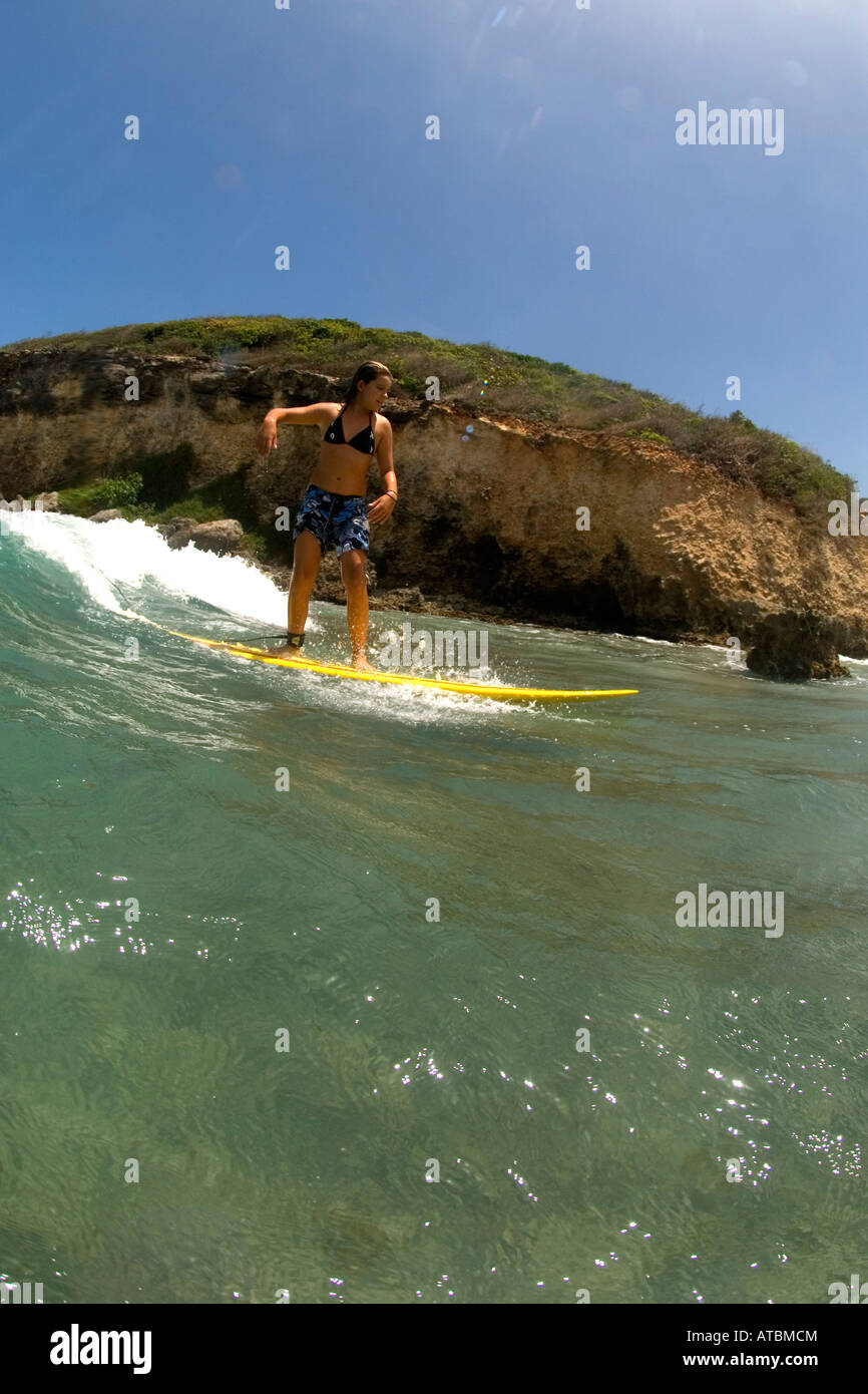 Kid surfing in the Caribbean, summer, holiday, vacation, water sport ...