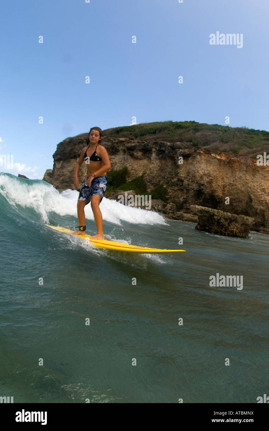 Kid surfing in the Caribbean, summer, holiday, vacation, water sport ...