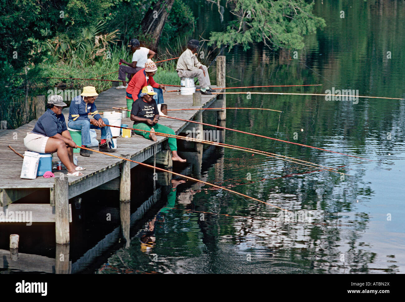 Fishing on a dock in Florida Stock Photo - Alamy