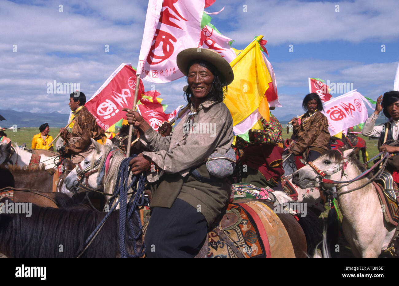 Tibetan cowboys during the Litang horse festival. Sichuan, China Stock ...