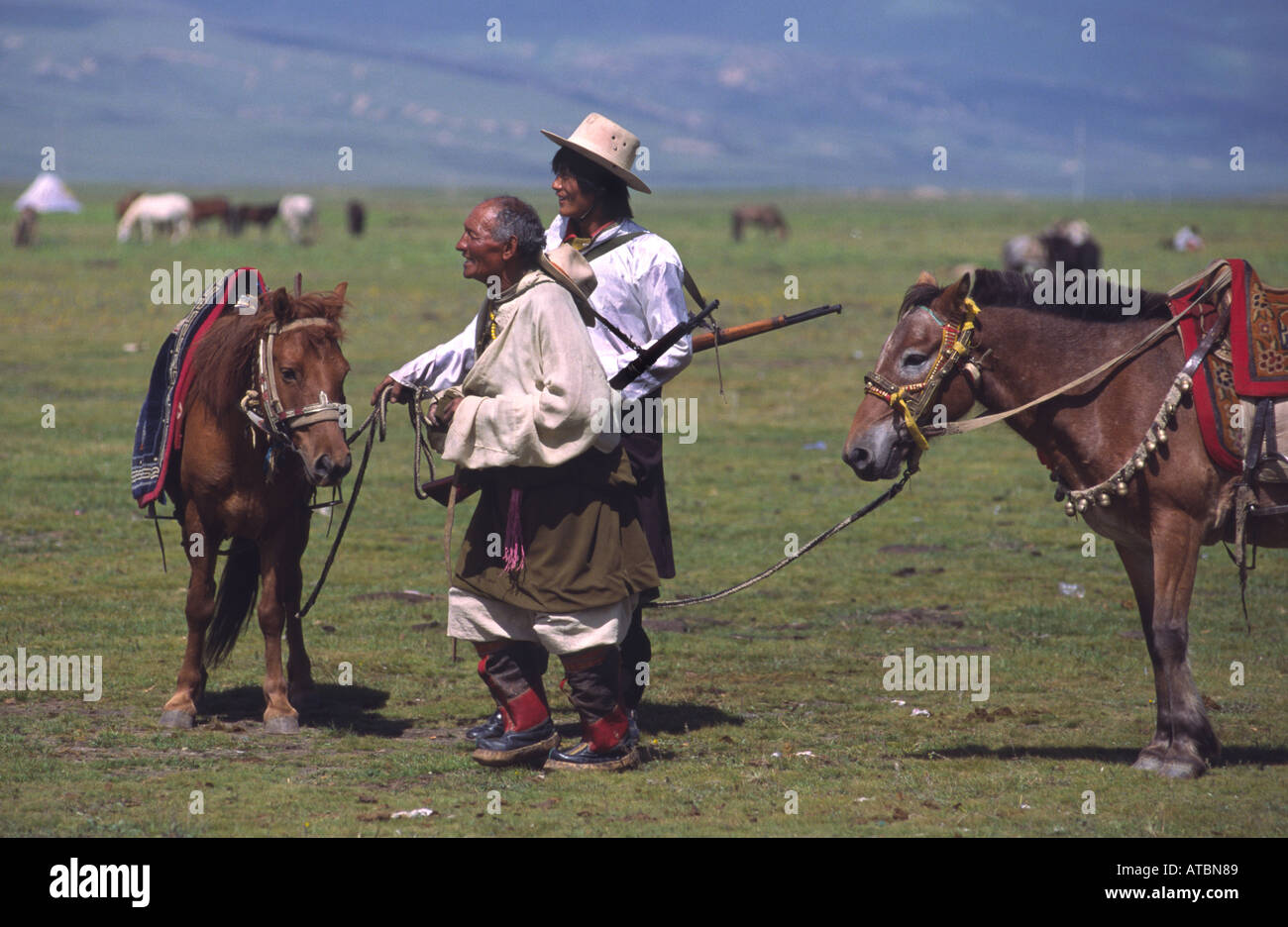 Khampa cowboys waiting for races to start at Litang horse festival ...