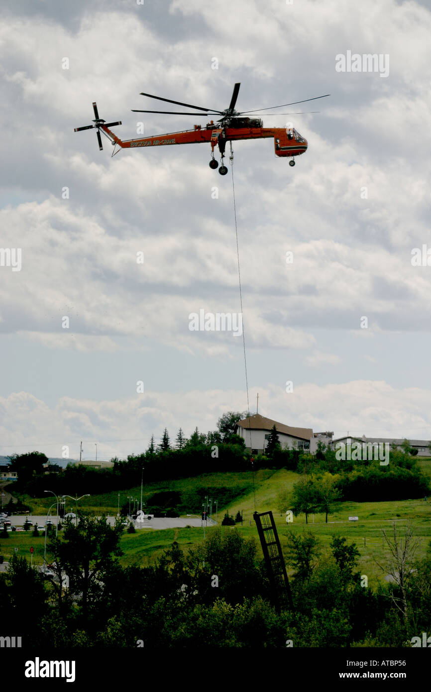 HELICOPTER; sky crane replacing a steel pedestrian bridge Stock Photo ...