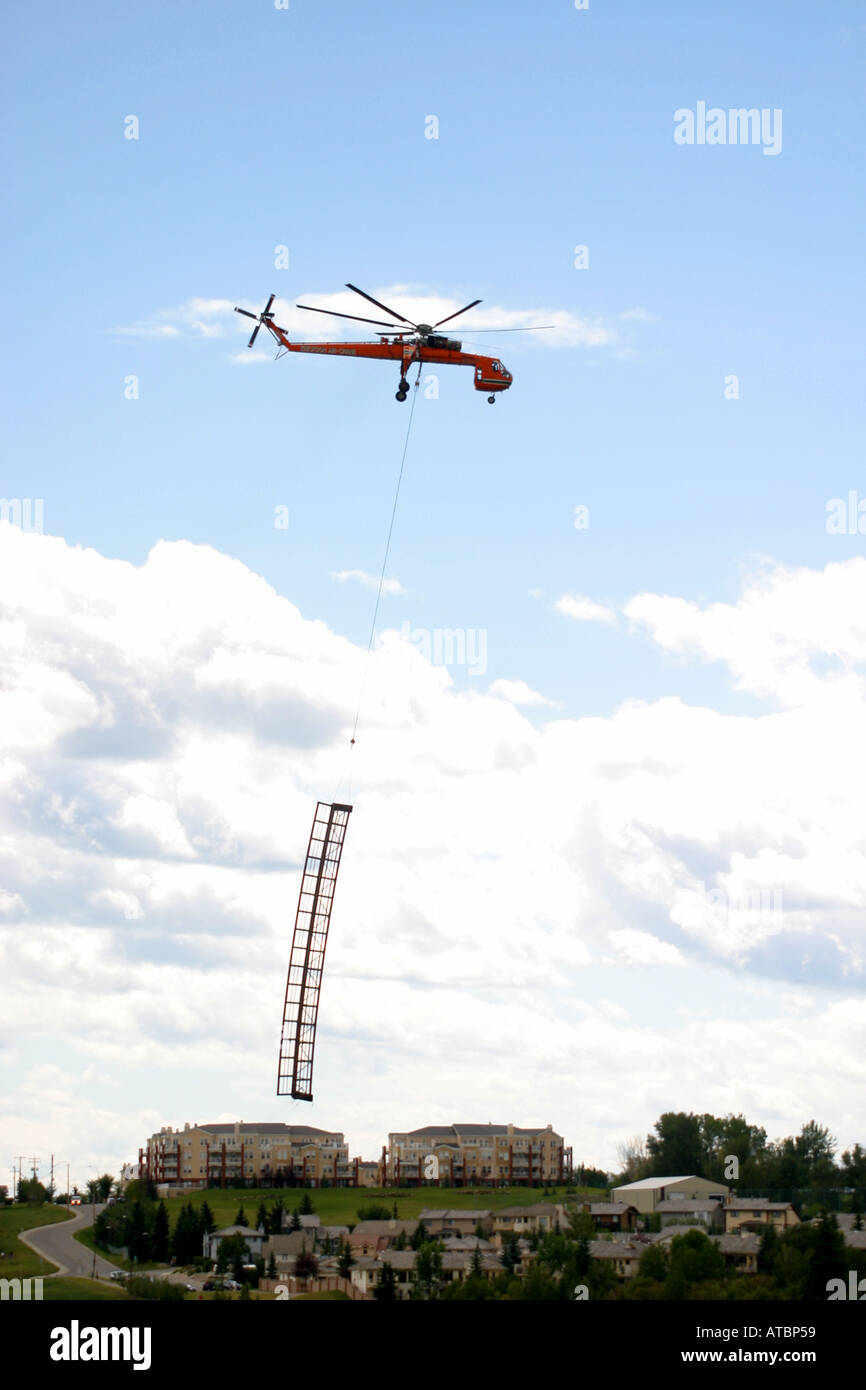 HELICOPTER; sky crane replacing a steel pedestrian bridge Stock Photo ...