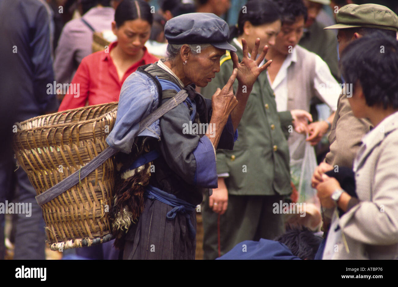 Naxi person carrying basket hi-res stock photography and images - Alamy