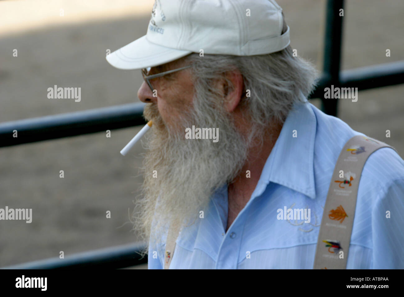 Older man in blue shirt hi-res stock photography and images - Alamy