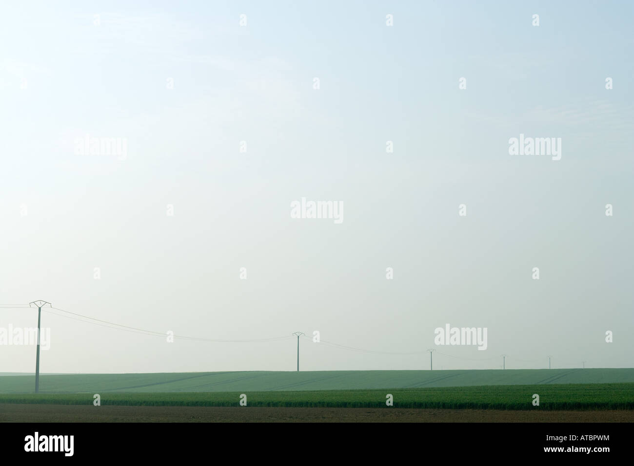 Landscape with power lines Stock Photo - Alamy