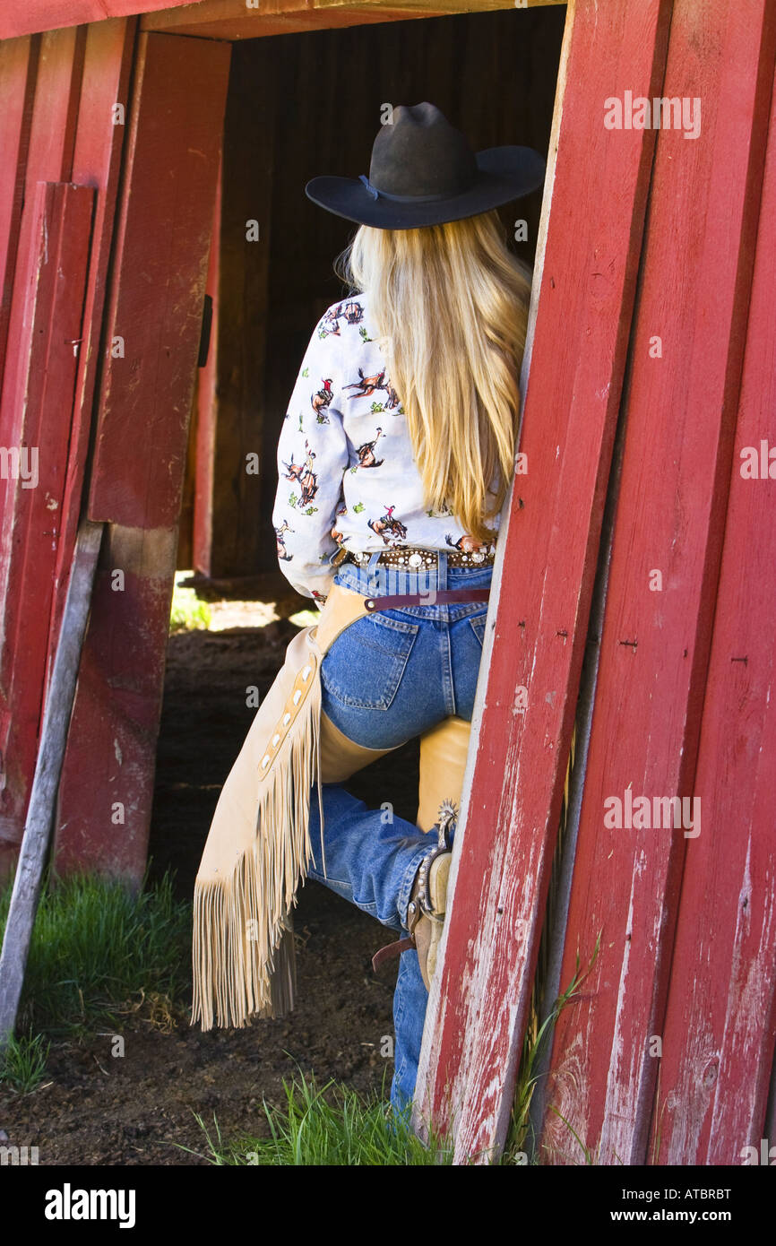 cowgirl at a barn, USA, Oregon Stock Photo - Alamy