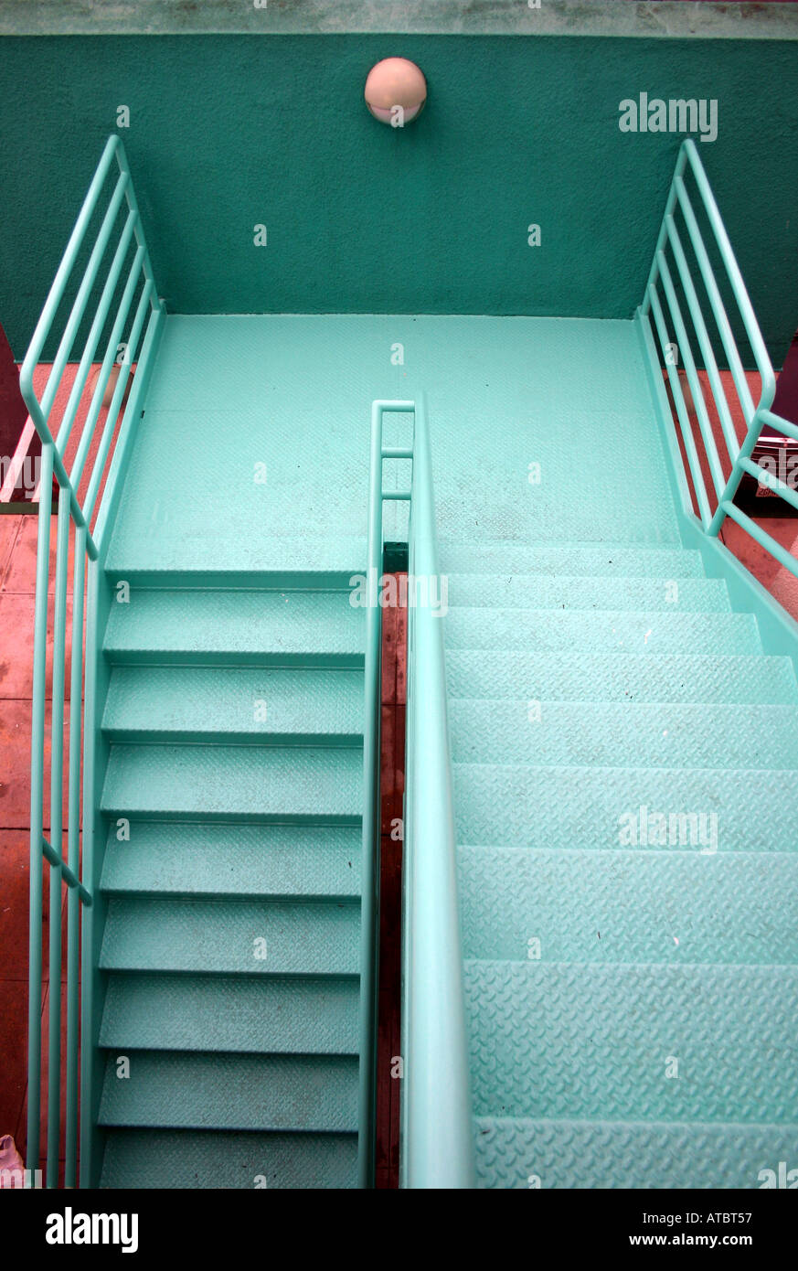green staircase railing Stock Photo - Alamy