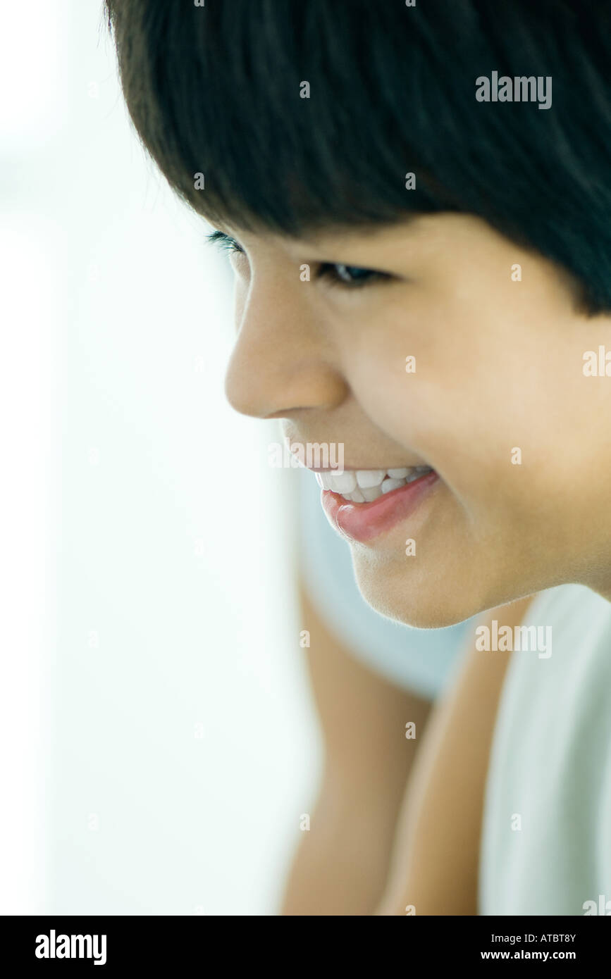 Boy smiling, profile Stock Photo - Alamy