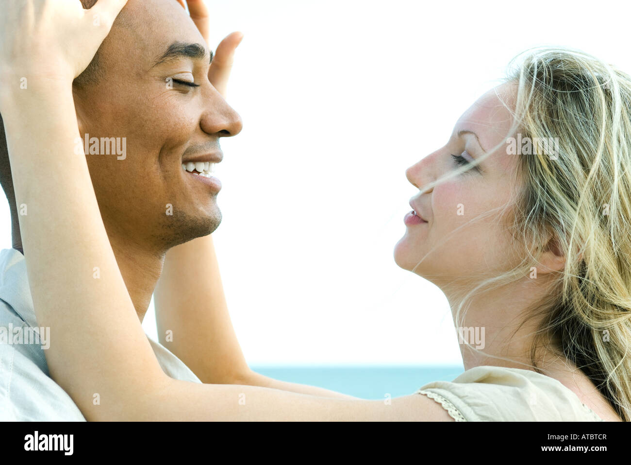 Woman touching mans face hi-res stock photography and images - Alamy