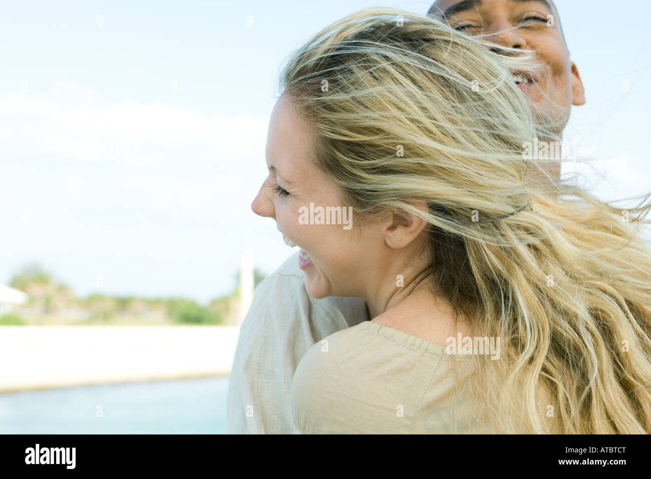 Side view laughing caucasian couple hi-res stock photography and images ...