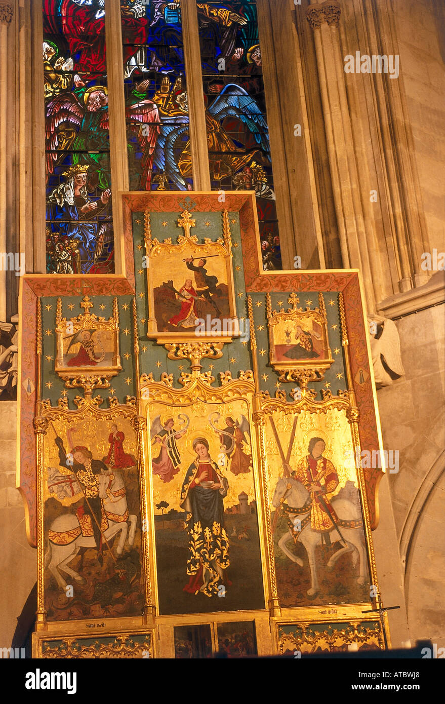 The triptych decorated with medieval style paintings set against an ...