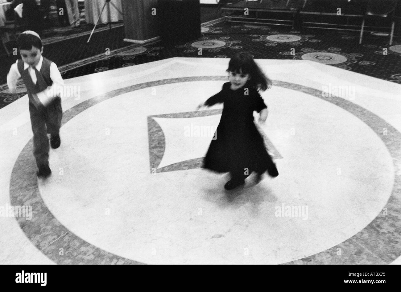 Israel Jerusalem 2 young children dancing on stage during a Bar Mitsva ...