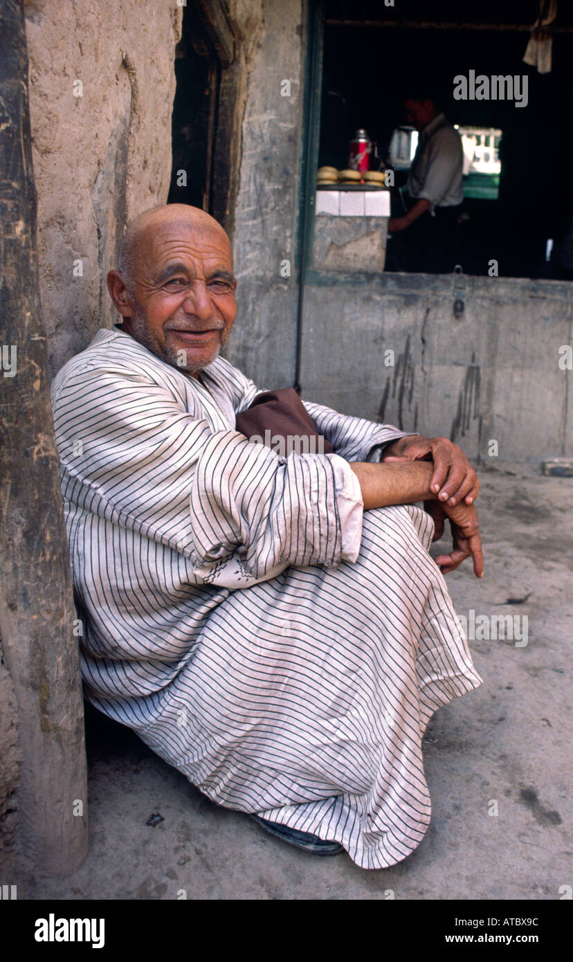 Uyghur man in traditional outfit. Kasghar, Xingjiang, China Stock Photo ...