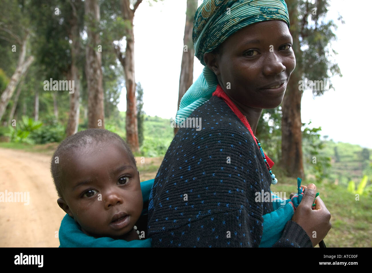 A Rwandan baby is carried on her mother s back in Rwanda Central Africa ...