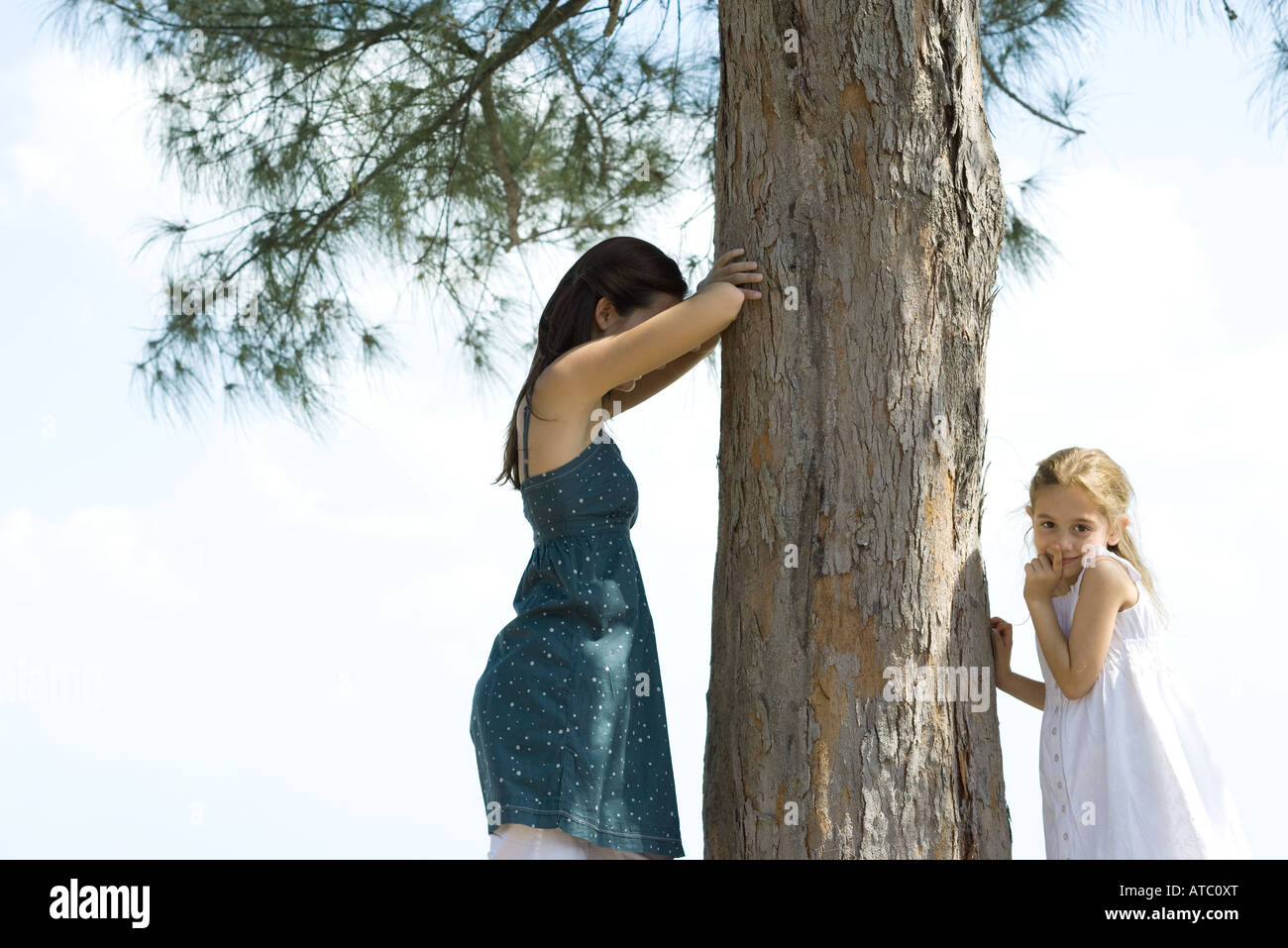 Hide and seek with friends hi-res stock photography and images - Alamy