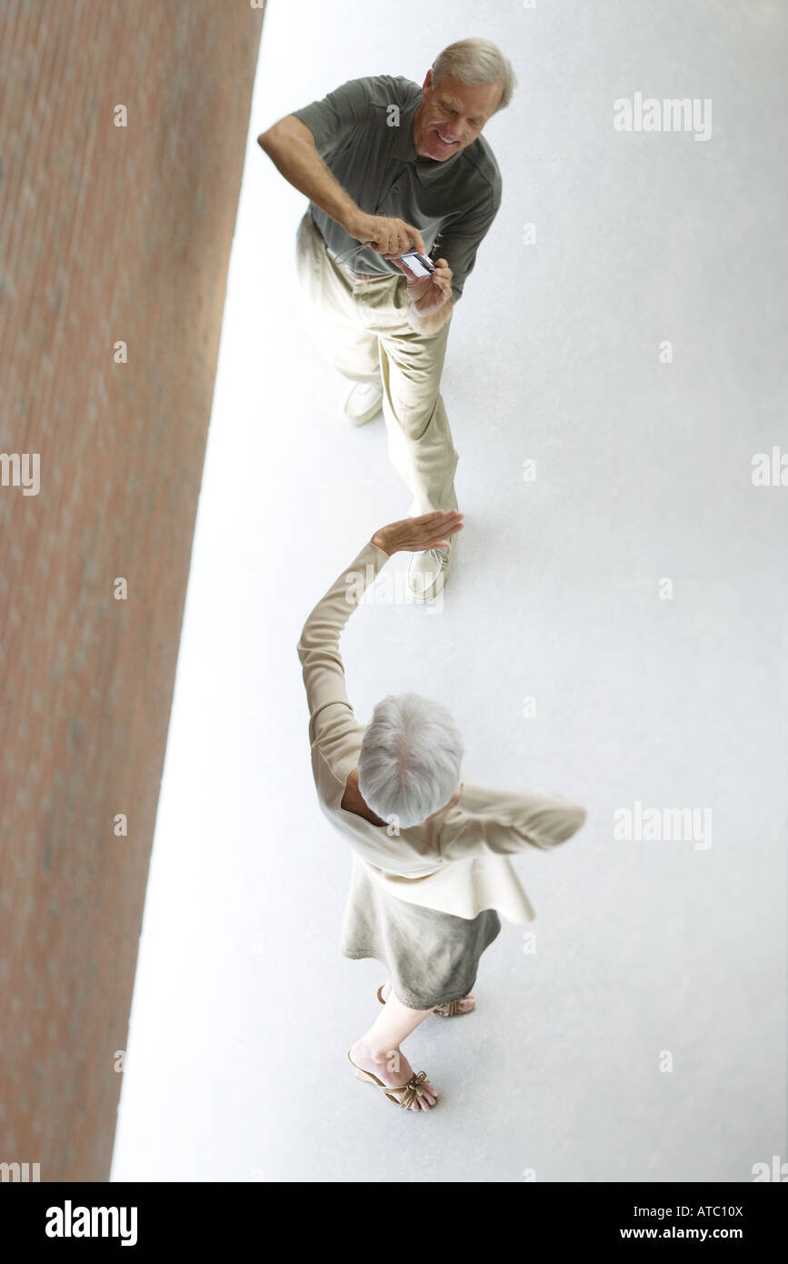 Both man woman standing other poses hi-res stock photography and images ...