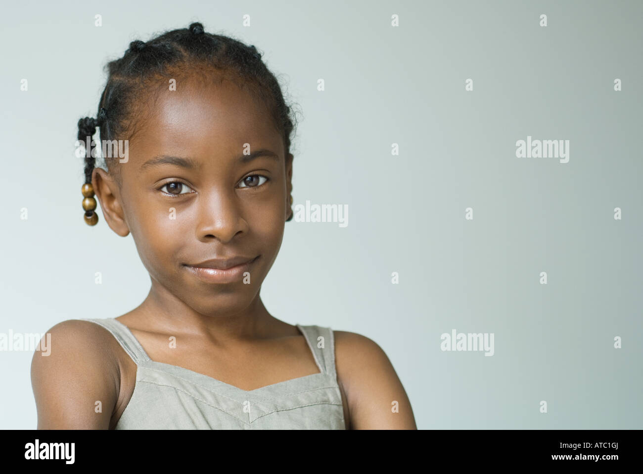 Girl smiling at camera, portrait Stock Photo - Alamy