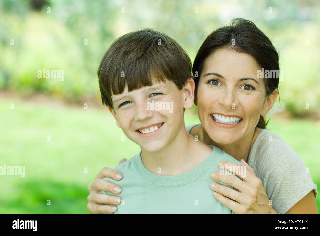 Mother smiles son hands hi-res stock photography and images - Alamy