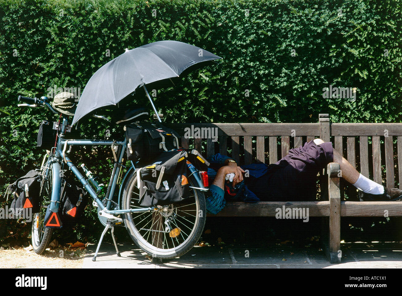 Asleep on a bench hi-res stock photography and images - Alamy