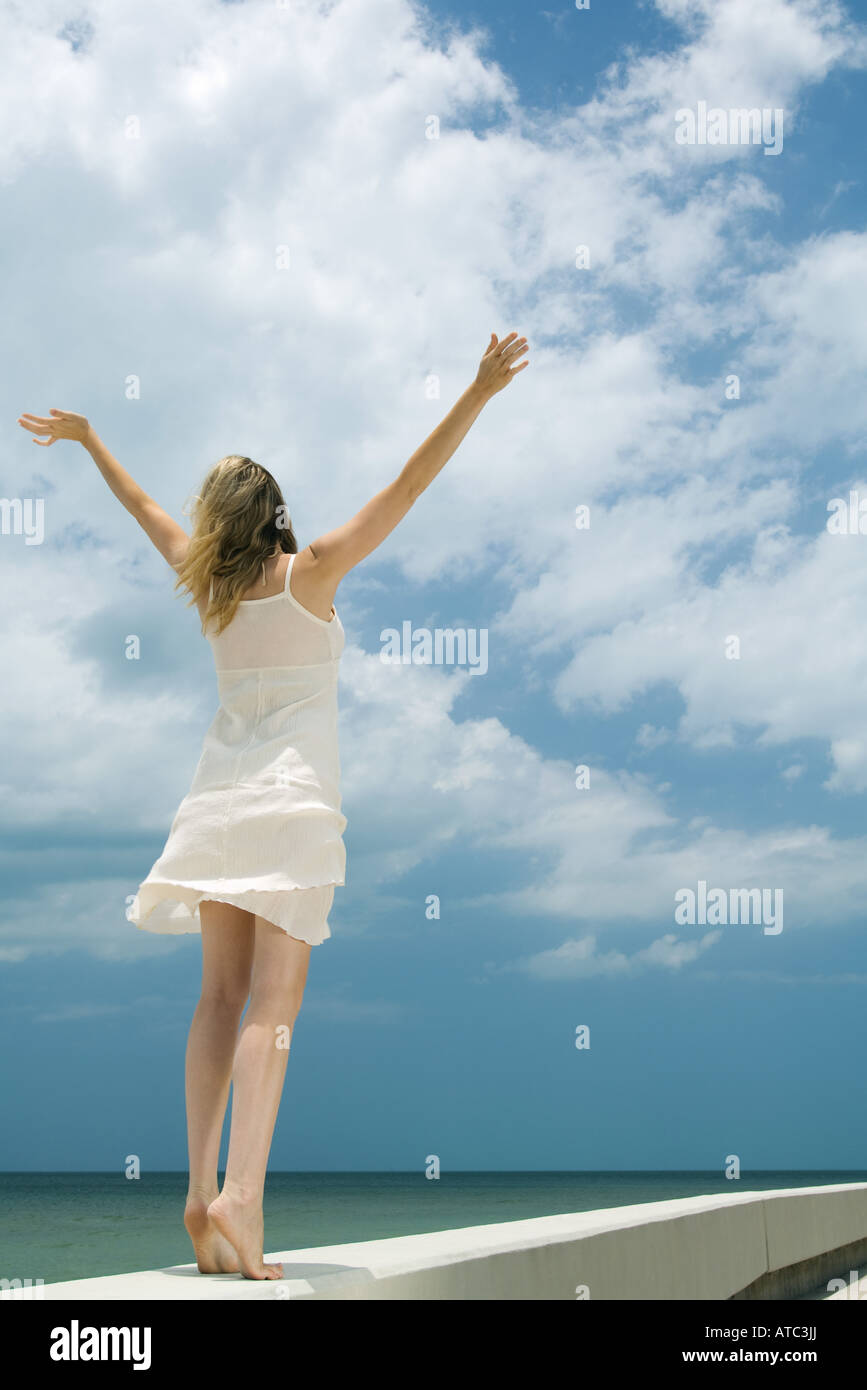 Woman reaching tip toe rear view hi-res stock photography and images ...