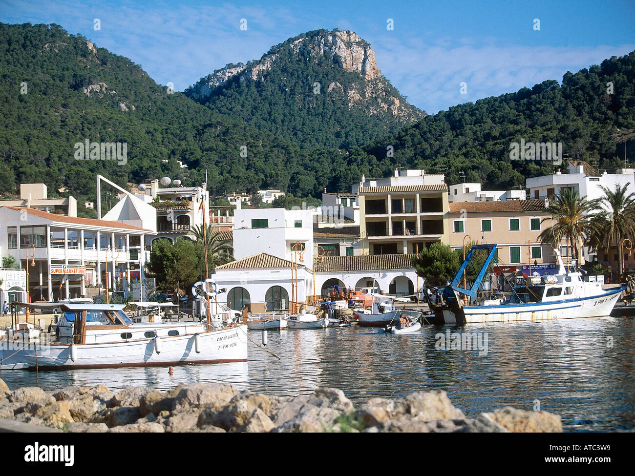 The harbour at Port d Antratx where the waterfront buildings are ...