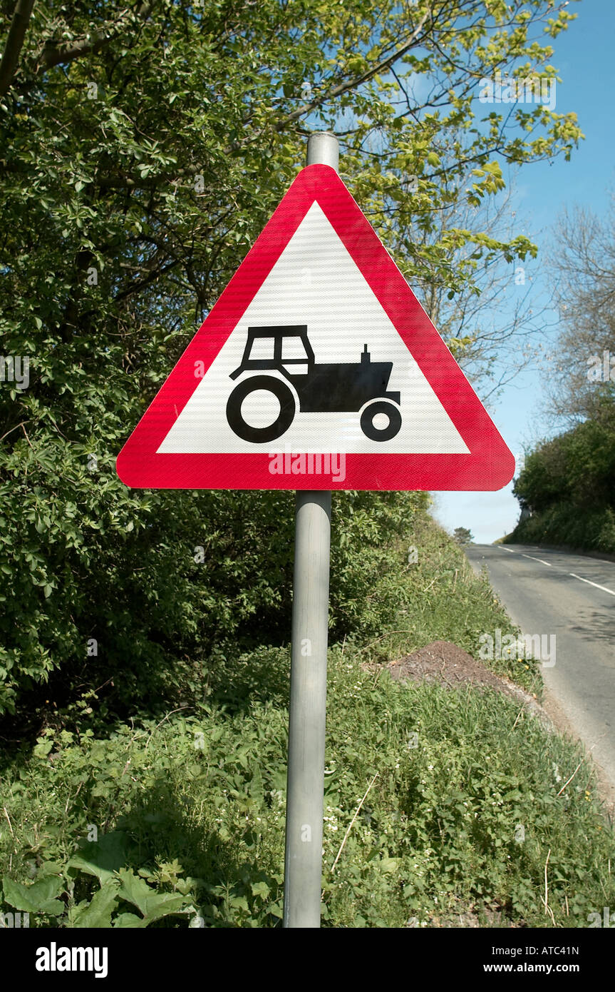 tractor roadsign warning triangle danger roadsign Stock Photo - Alamy