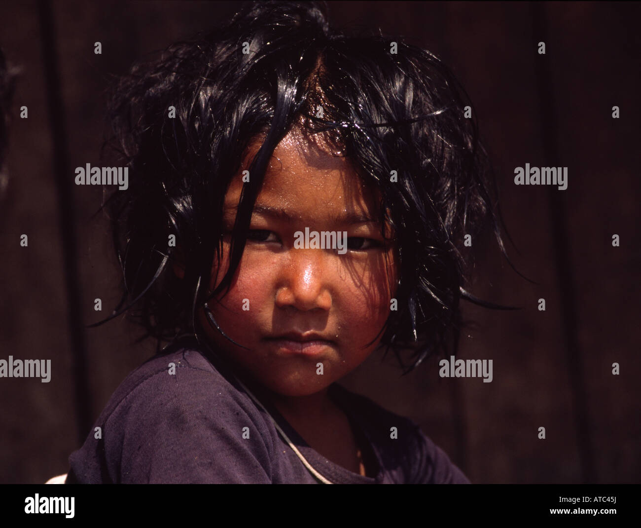 A child photographed in the Annapurna region of Nepal Stock Photo - Alamy