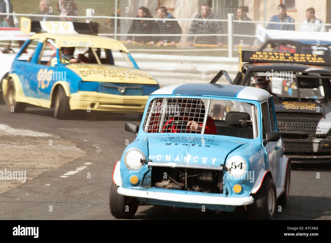 stock cars racing a on a tarmac track Stock Photo - Alamy
