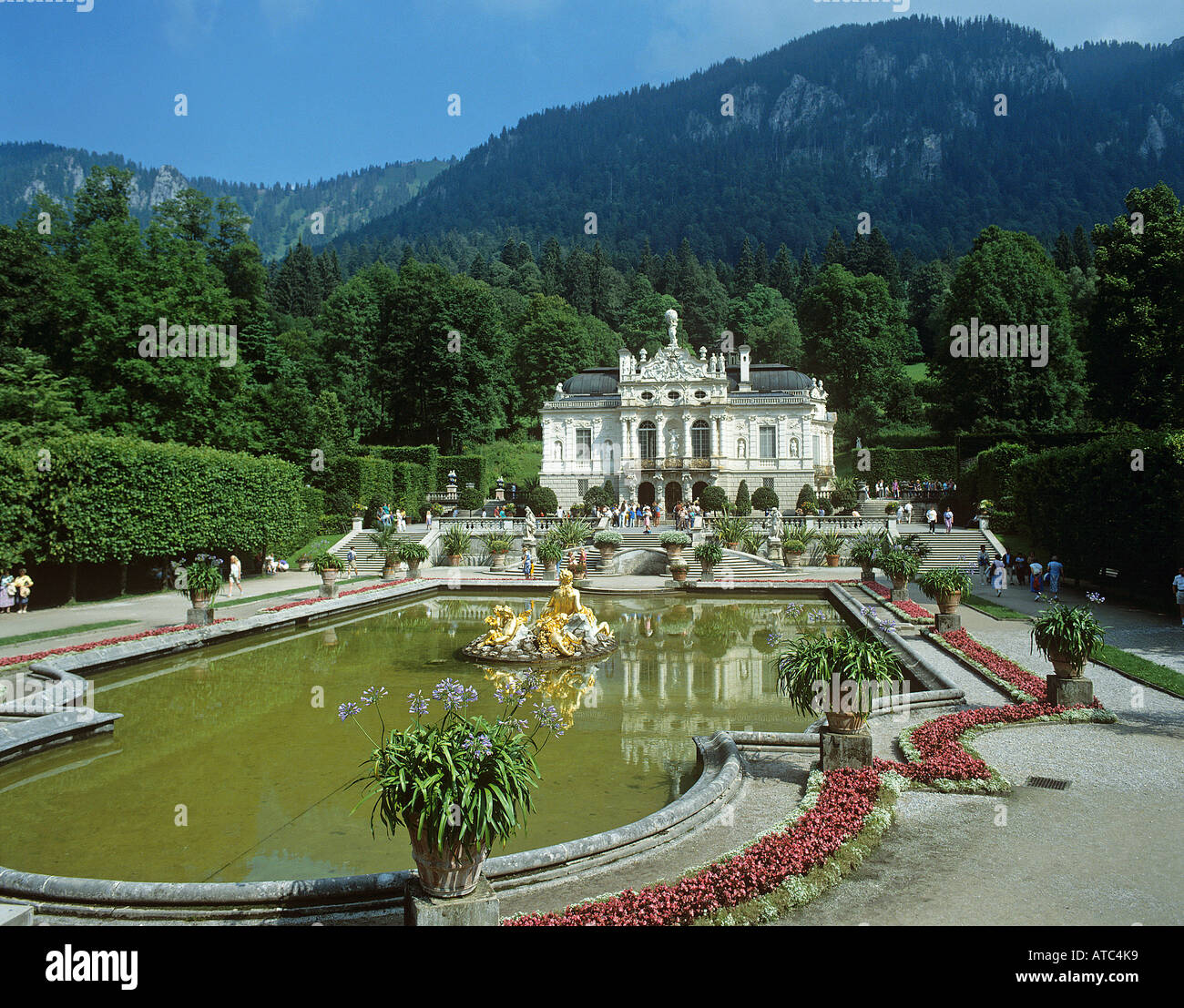Gilded statuary in the centre of an ornamental pond in the formal ...