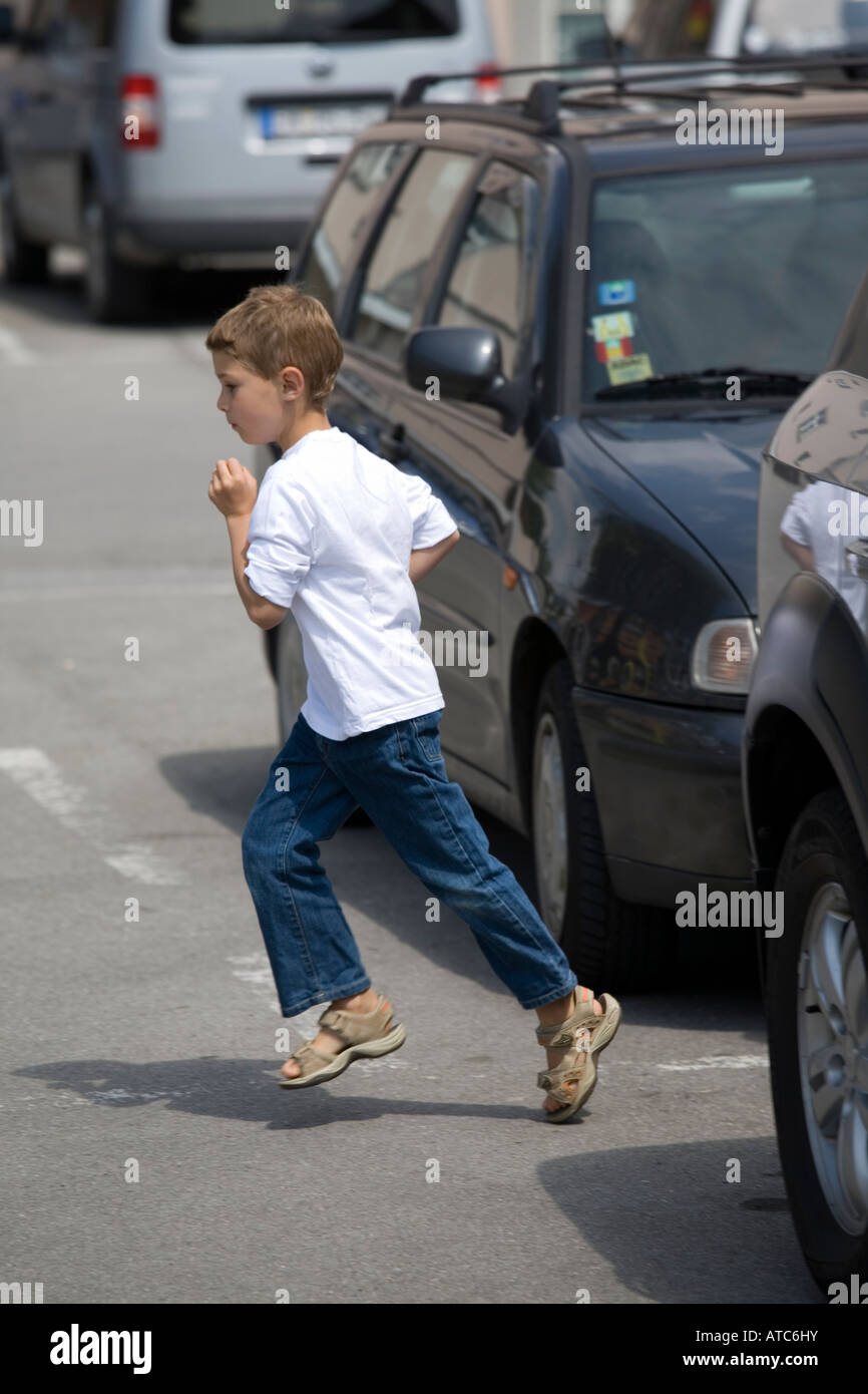 Children in the traffic Stock Photo - Alamy