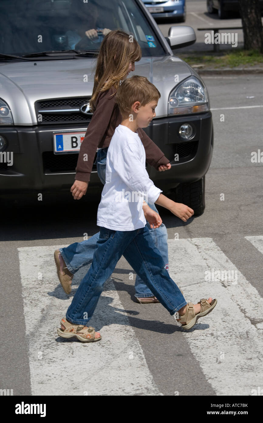 Children in the traffic Stock Photo - Alamy