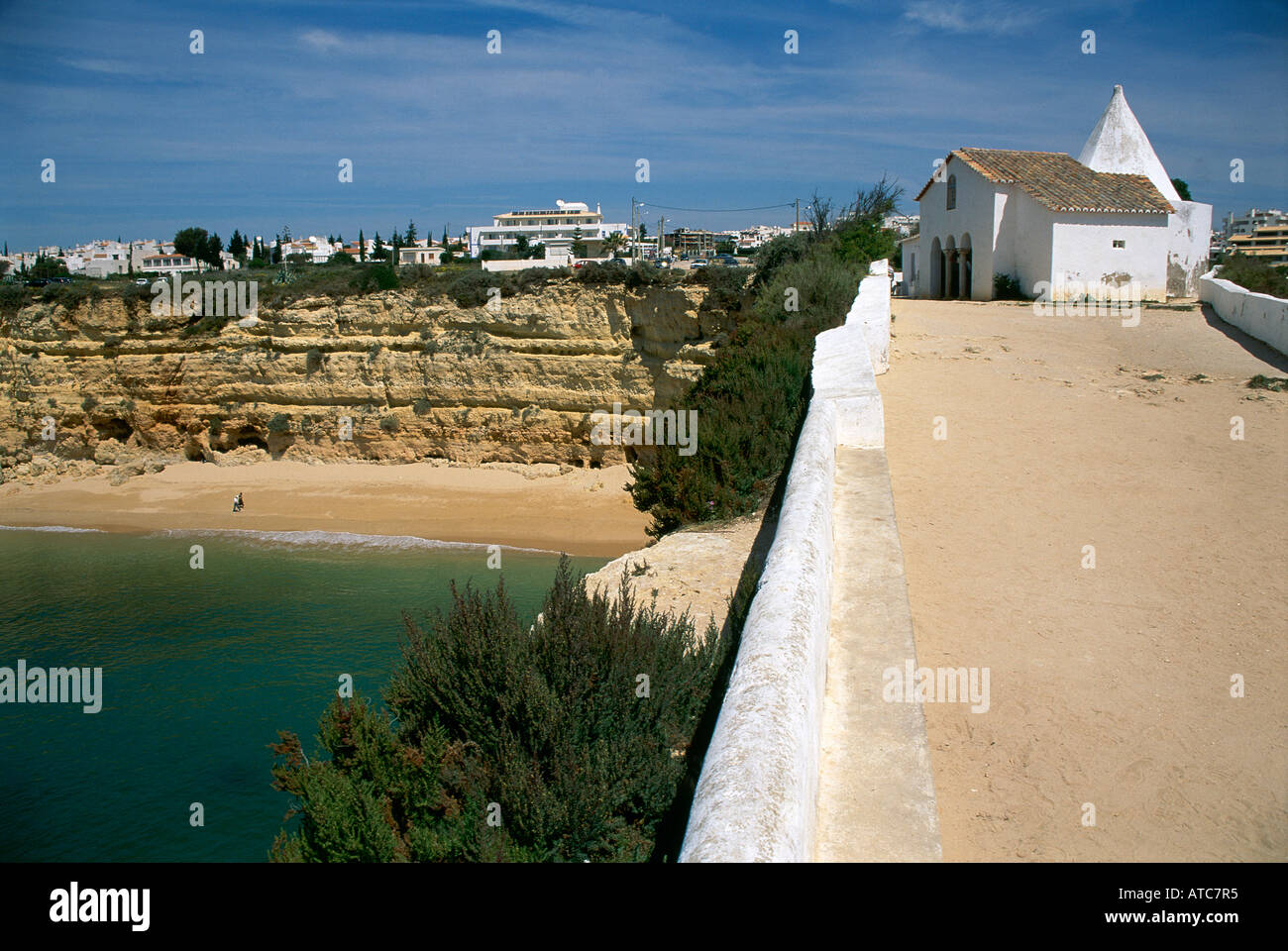 The tiny whitewashed Romanesque Vila Senhora da Rocha church which is ...