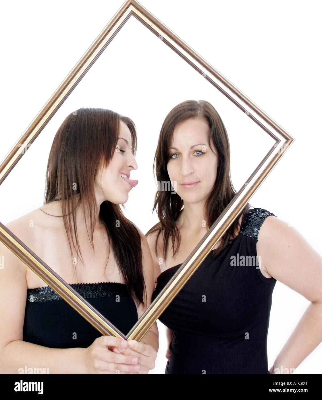 Twin sisters looking other hi-res stock photography and images - Alamy