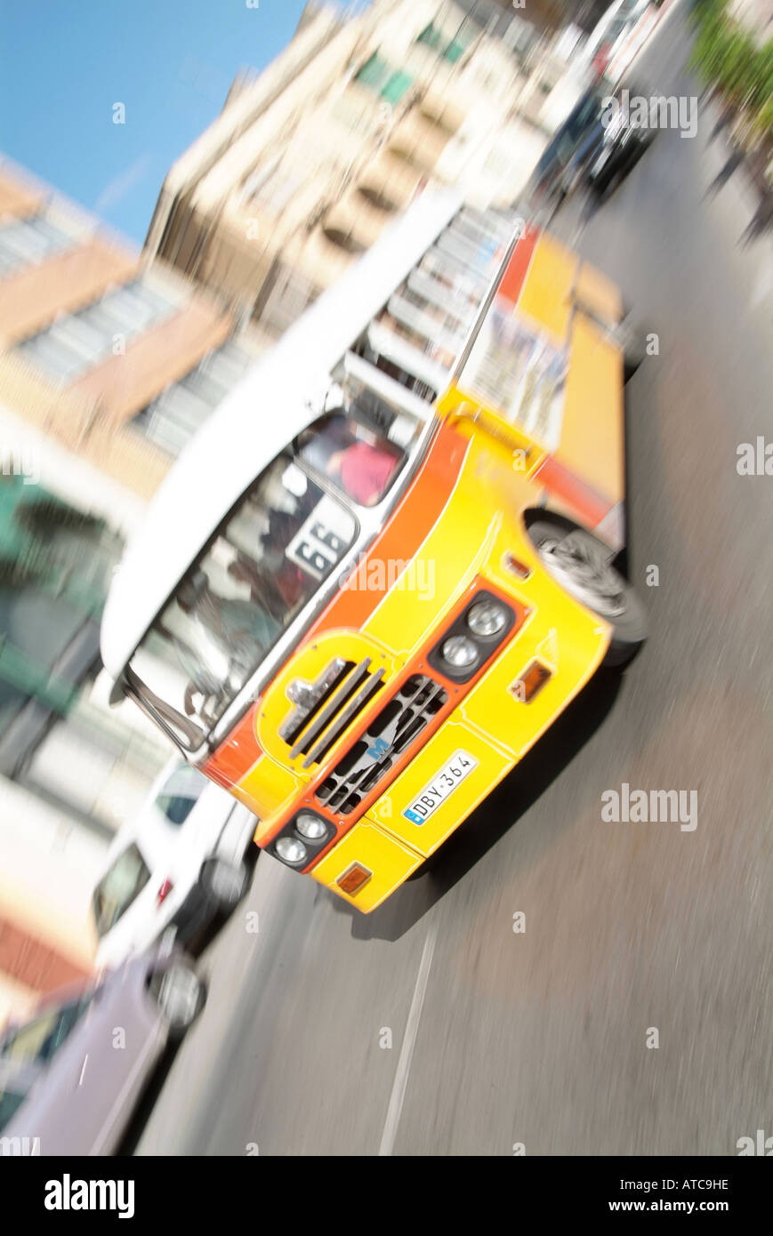 old british bus at speed on malta Stock Photo - Alamy