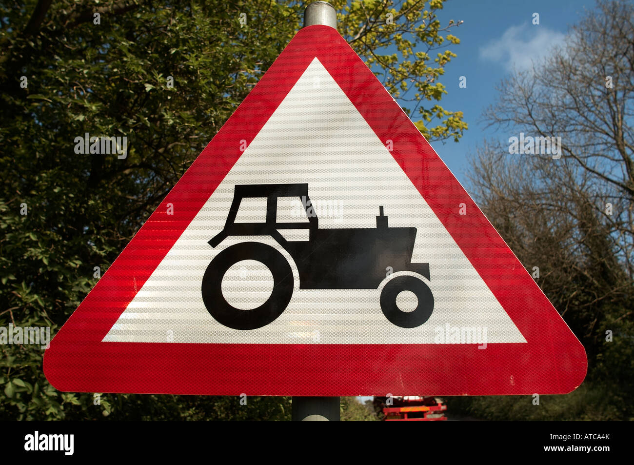 tractor roadsign warning triangle danger roadsign Stock Photo - Alamy