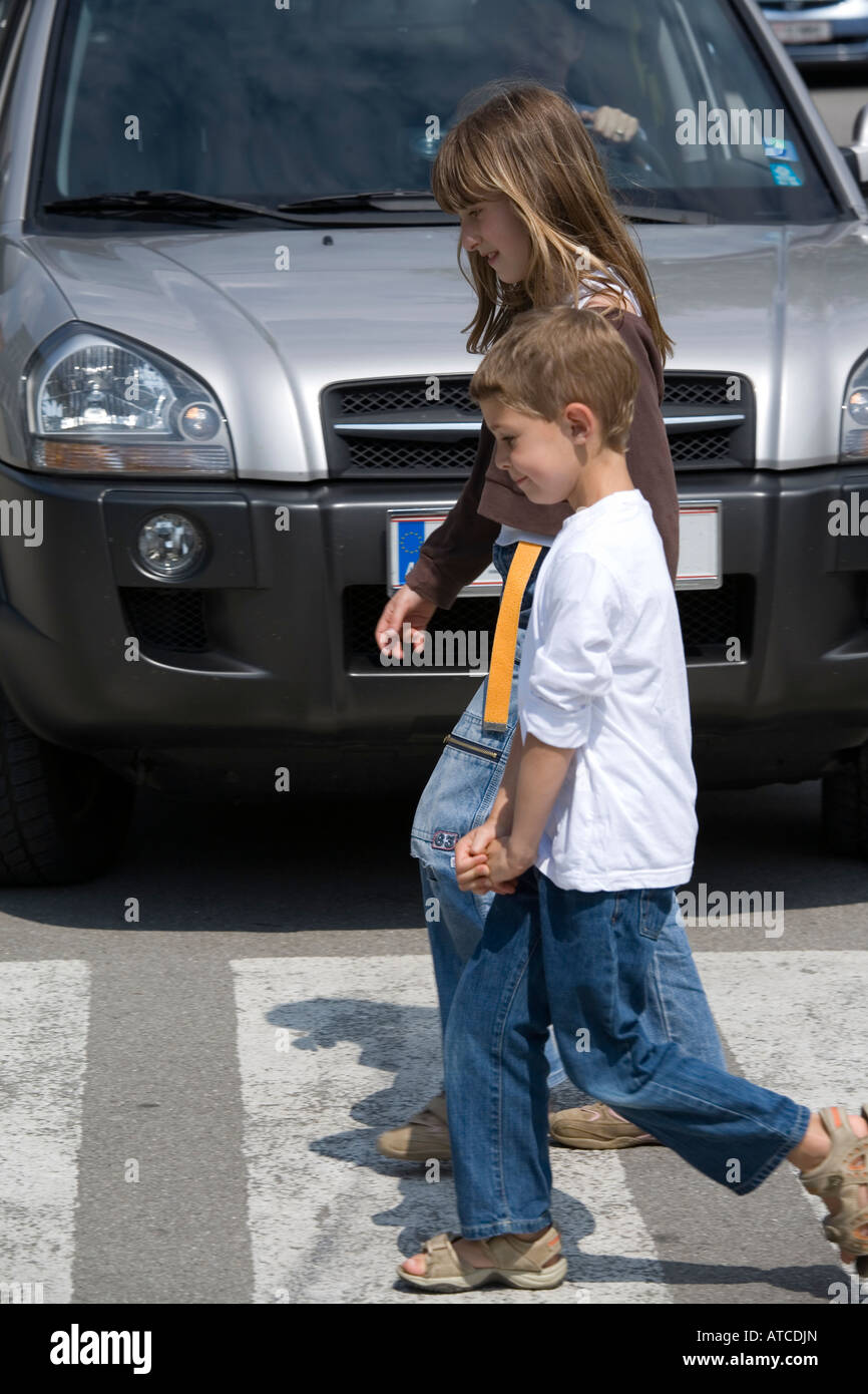 Children in the traffic Stock Photo - Alamy