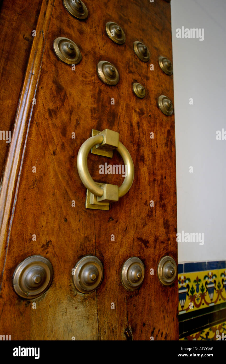 Ronda typical andalusian style wooden spiked door Stock Photo - Alamy