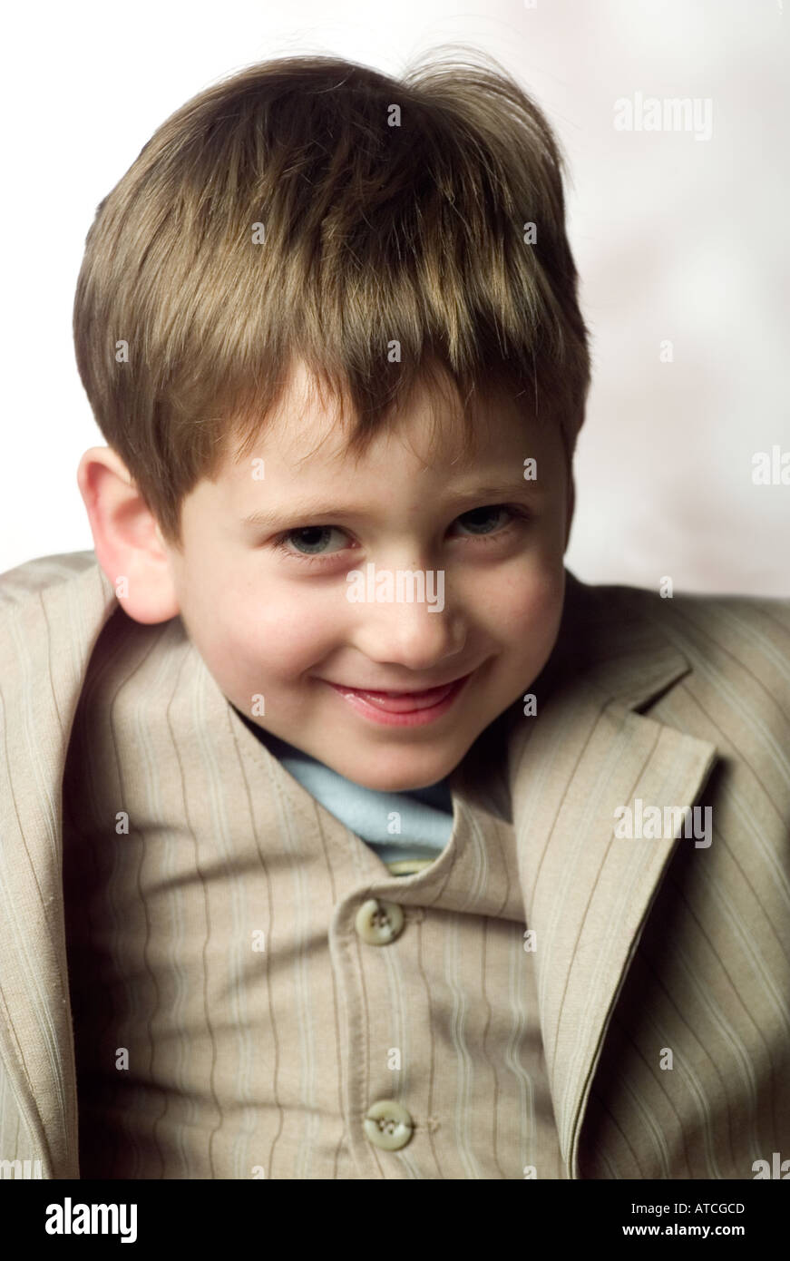 Portrait of Caucasian boy in suit Stock Photo - Alamy