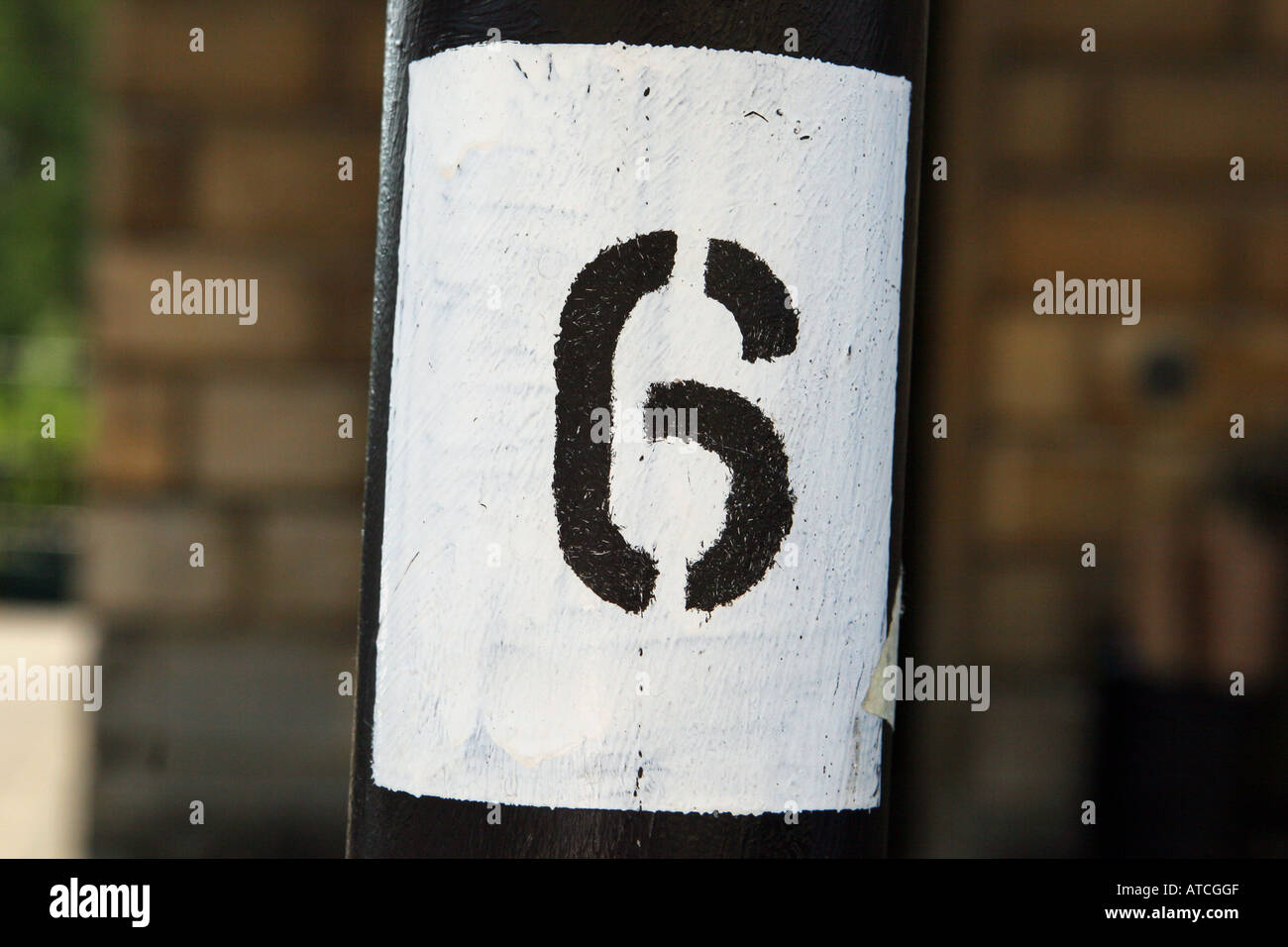 Painted number Six on a lamp post Stock Photo - Alamy