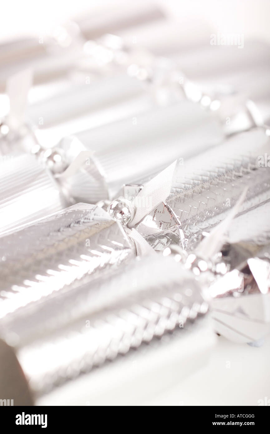 silver christmas crackers Stock Photo - Alamy
