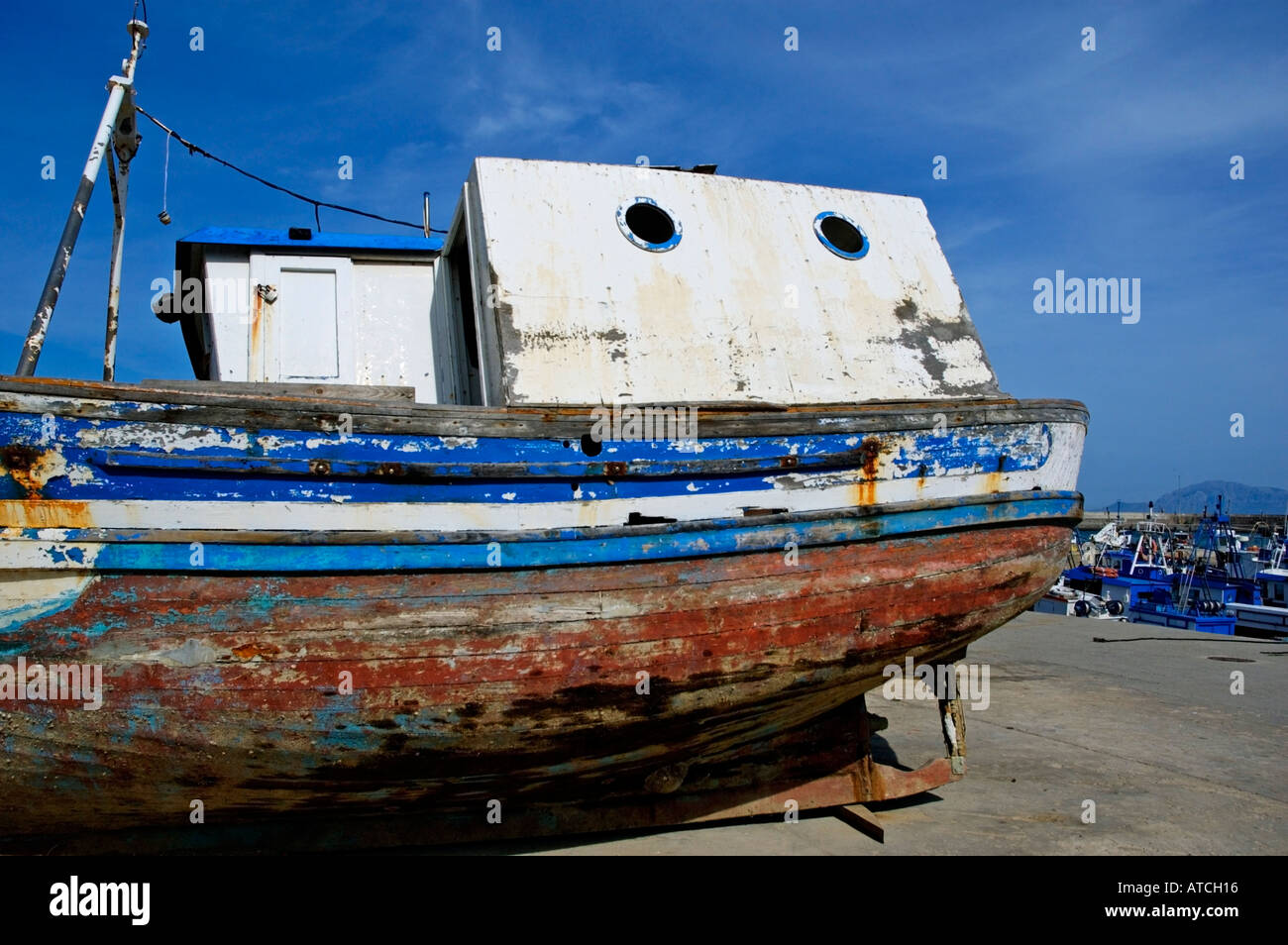 Tarifa an old fishing boat at wharf in need of a new painting Stock ...