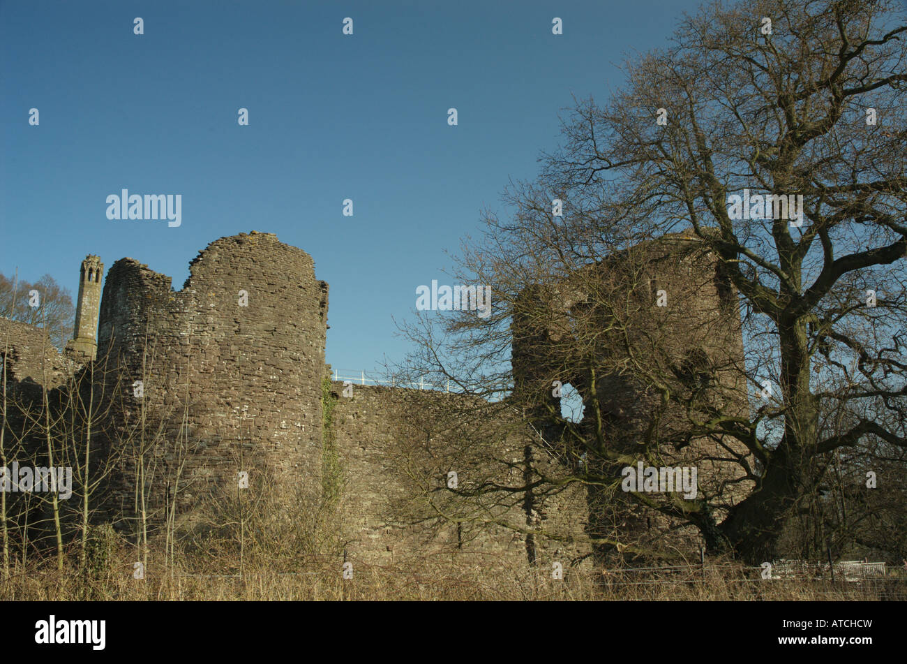 Two round towers and walls of ruined castle Stock Photo - Alamy
