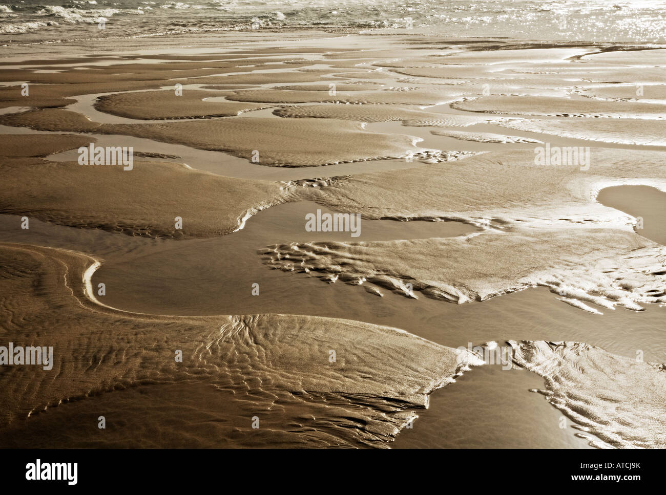 Beach sand rivulet hi-res stock photography and images - Alamy