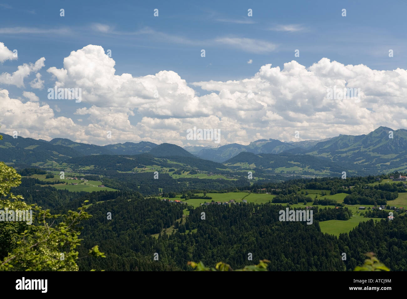 View from a mountain to the valley Stock Photo - Alamy