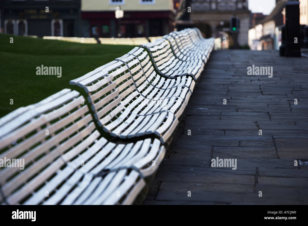 long line of wooden benches outside of Windsor Castle UK Stock Photo ...