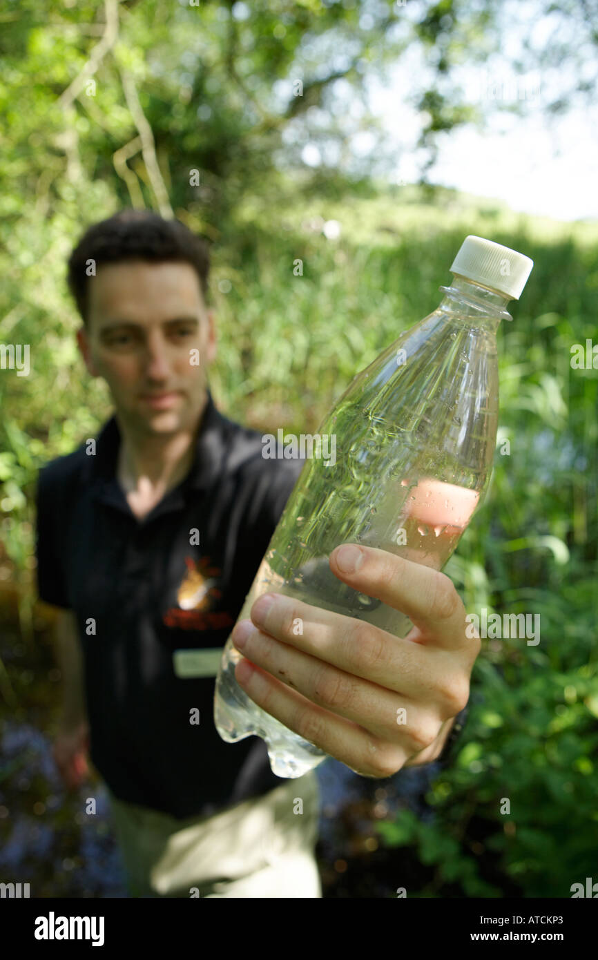 rspb warden collecting a water sample from Leighton Moss reserve for ...
