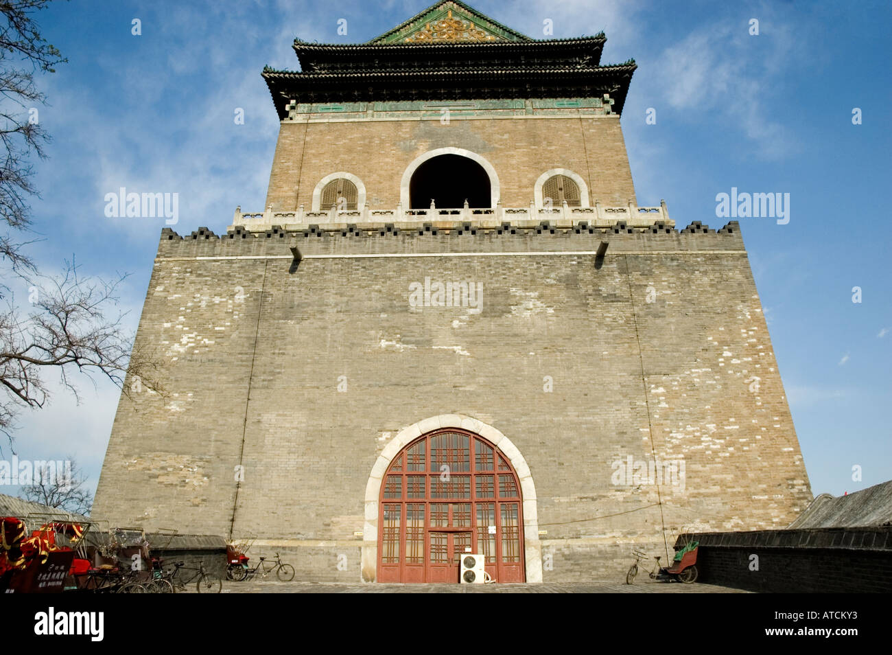 The massive gray stone walls of the double-eaved ancient Bell Tower ...