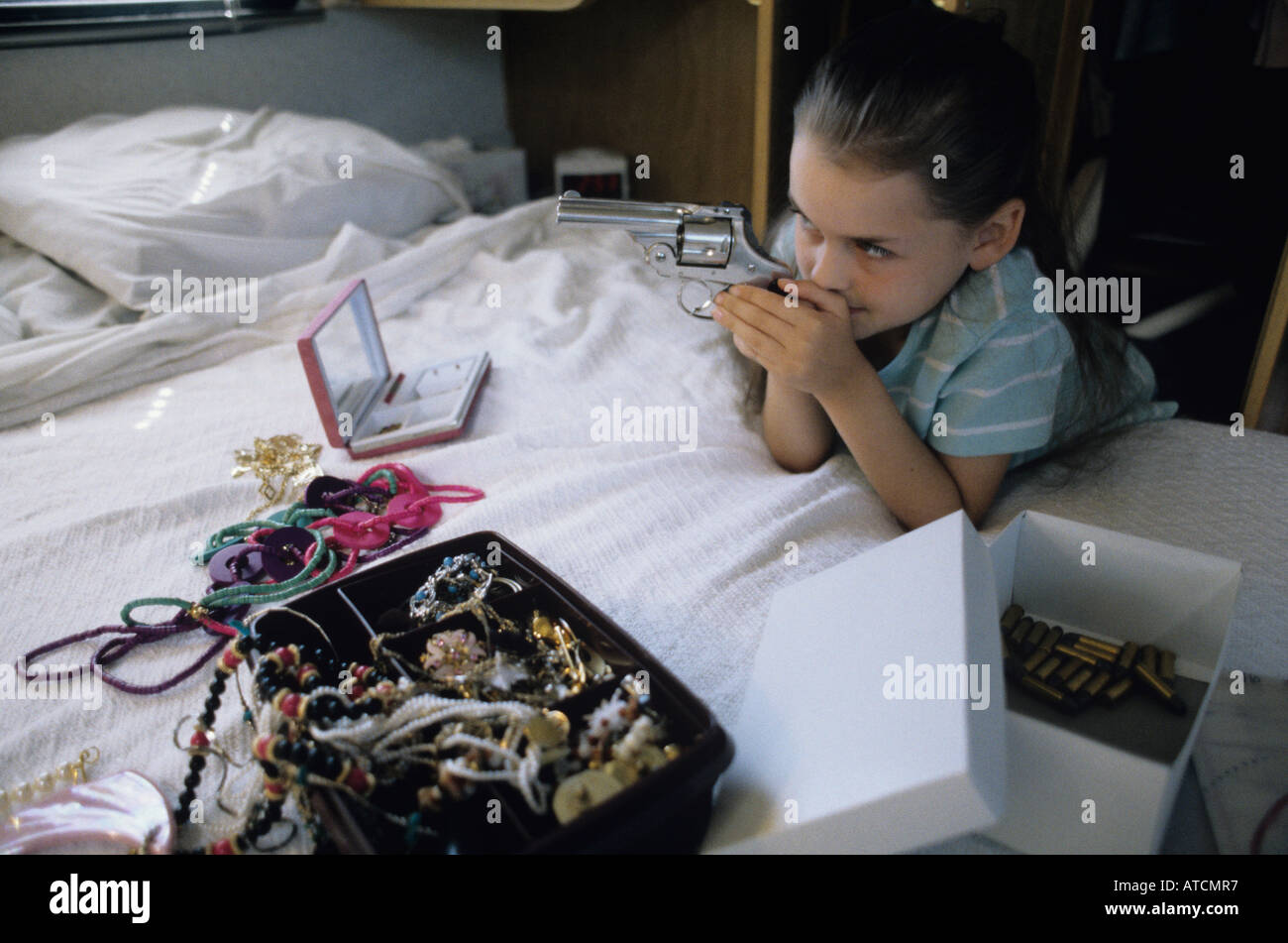 Social issue hand gun hi-res stock photography and images - Alamy