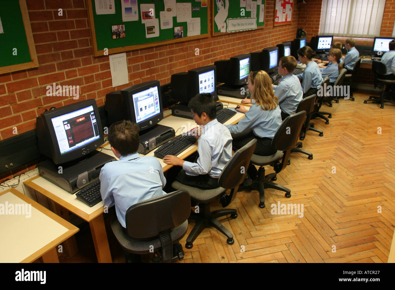 Mixed junior class in Computer room at independent school Stock Photo ...